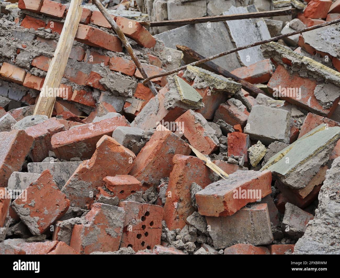 pile of broken red brick, the concept of destruction, the tragedy of ...