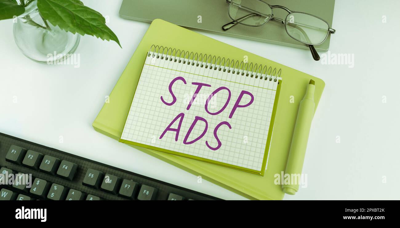 Sign displaying Stop Ads, Business idea program that will remove ...