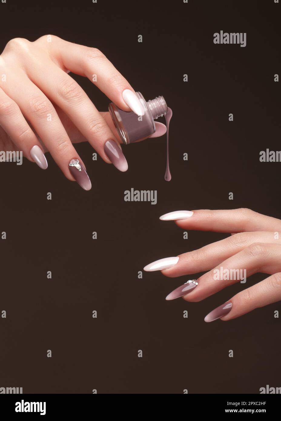 Beautiful classic manicure on female hand with nail polish. Close-up ...