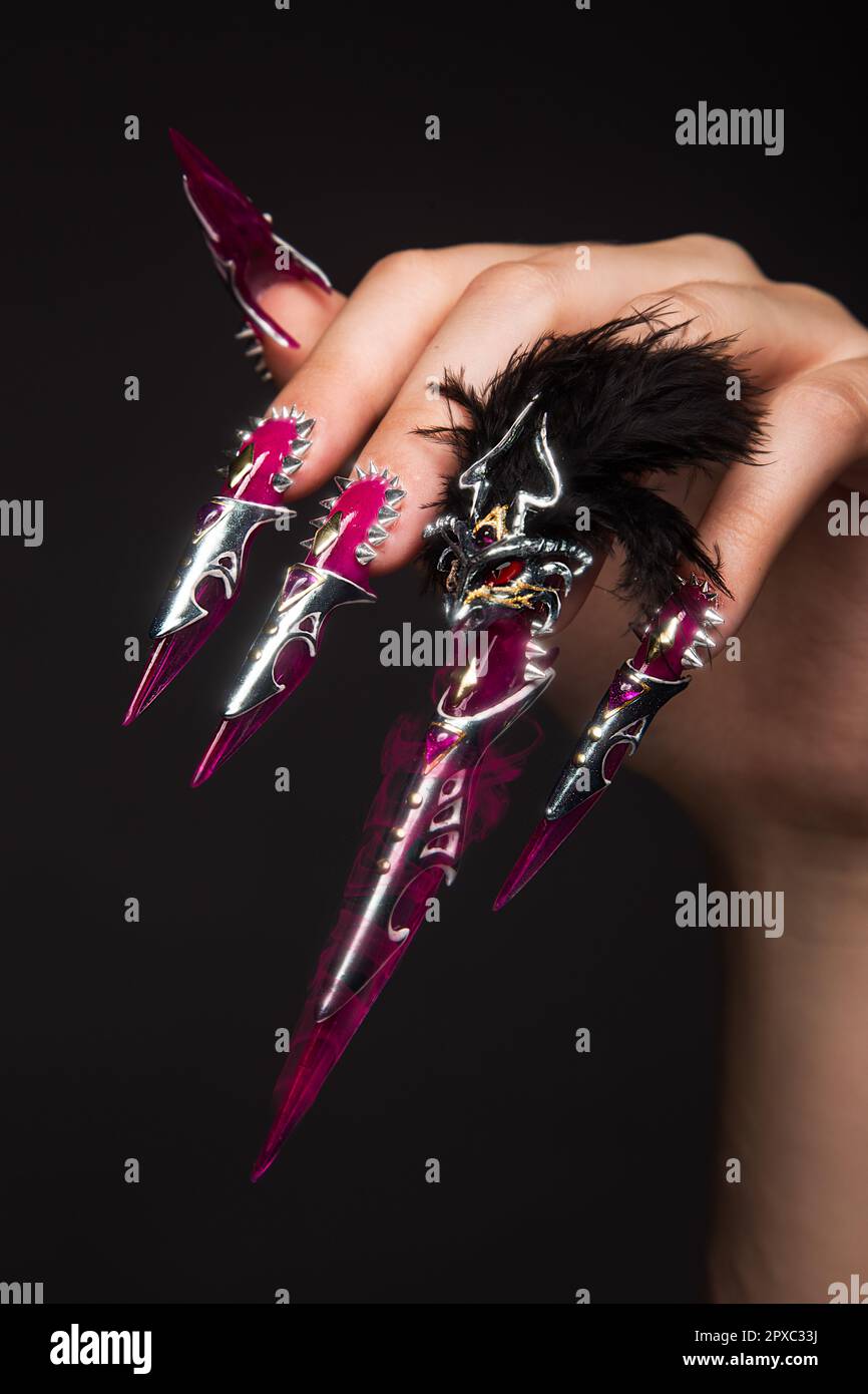 Creative design of nails on female hands. Art manicure. Photo taken in ...