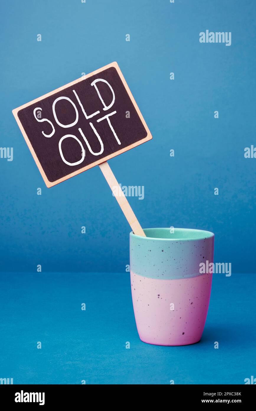 Hand writing sign Sold Out, Business approach Not available anymore ...