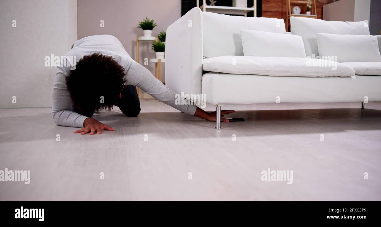 Lost Something Looking For Things. Searching Keys Stock Photo - Alamy