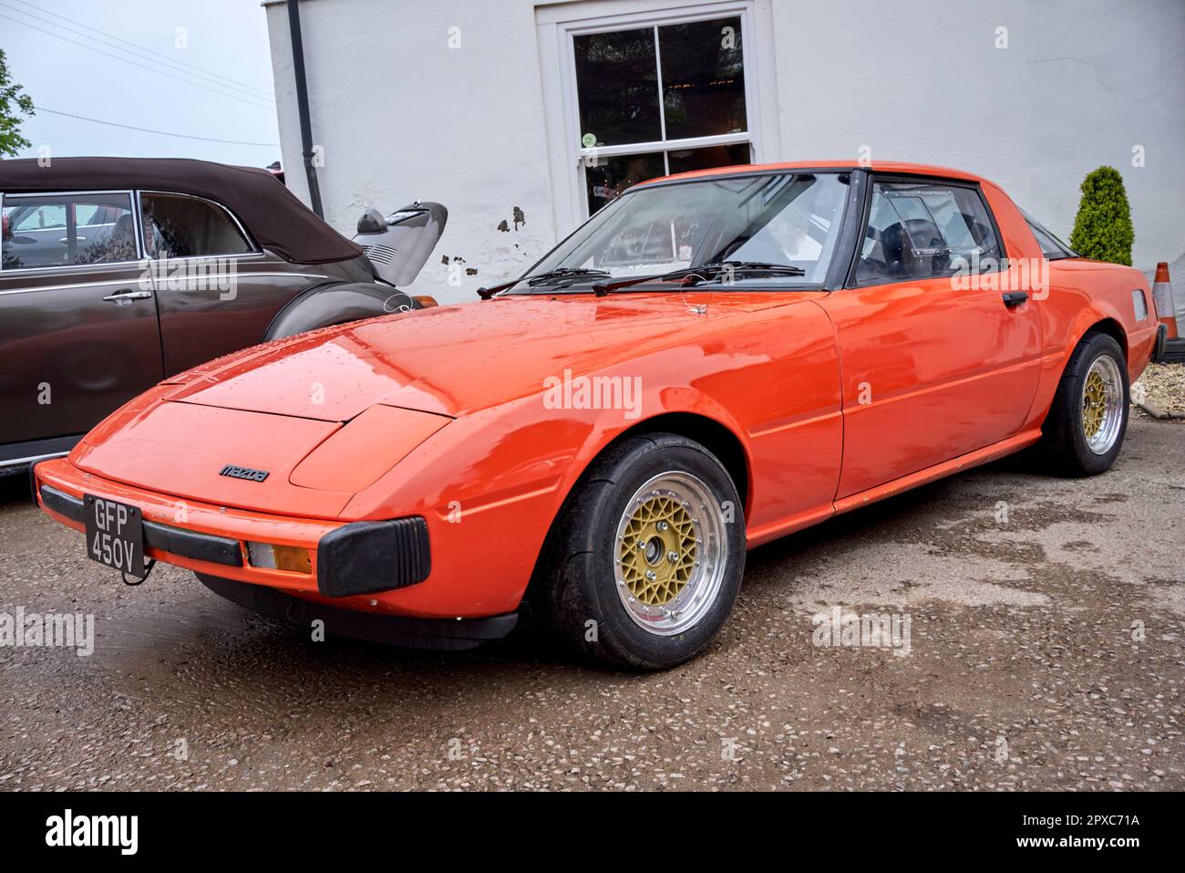 Mazda 7 1978 orange Stock Photo - Alamy