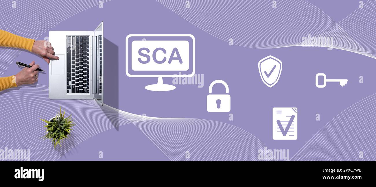 Top view of hands using laptop with symbol of sca concept Stock Photo ...