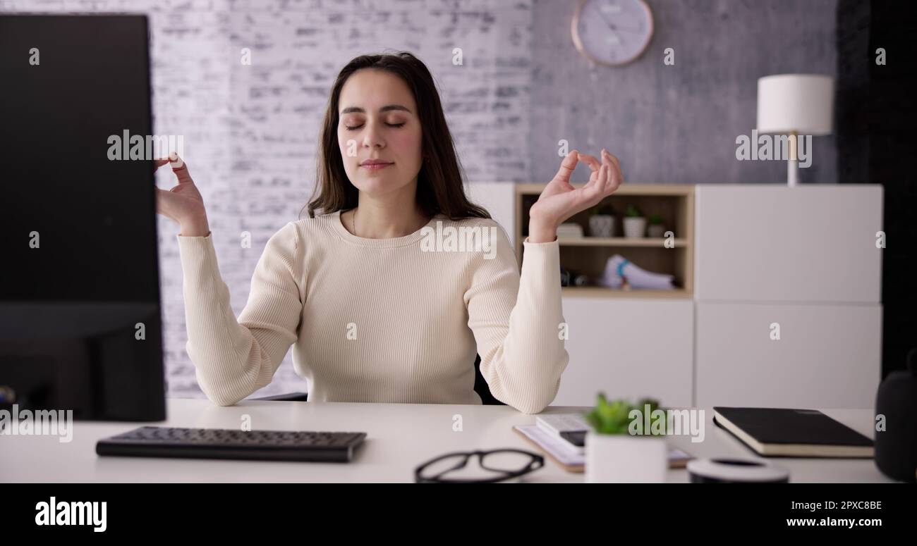 Healthy Yoga Meditation Exercise In Office Chair At Workplace Stock ...