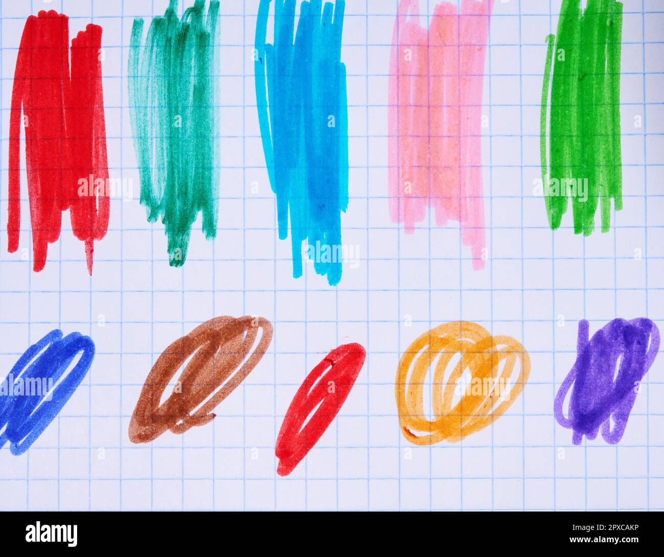 Multi-colored marker swatches on checkered paper Stock Photo - Alamy