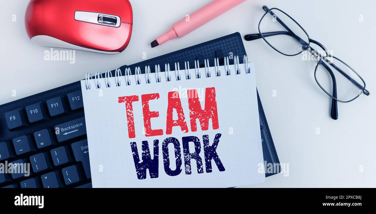 Text caption presenting Team Work, Internet Concept Combined action of ...