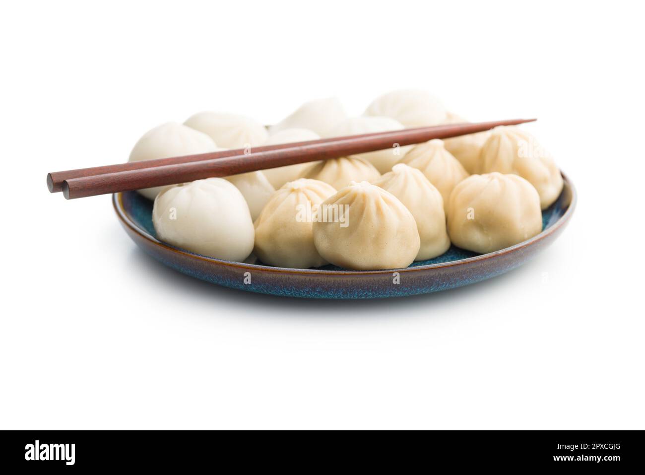 Xiaolongbao, traditional steamed dumplings on plate. Xiao Long Bao buns ...