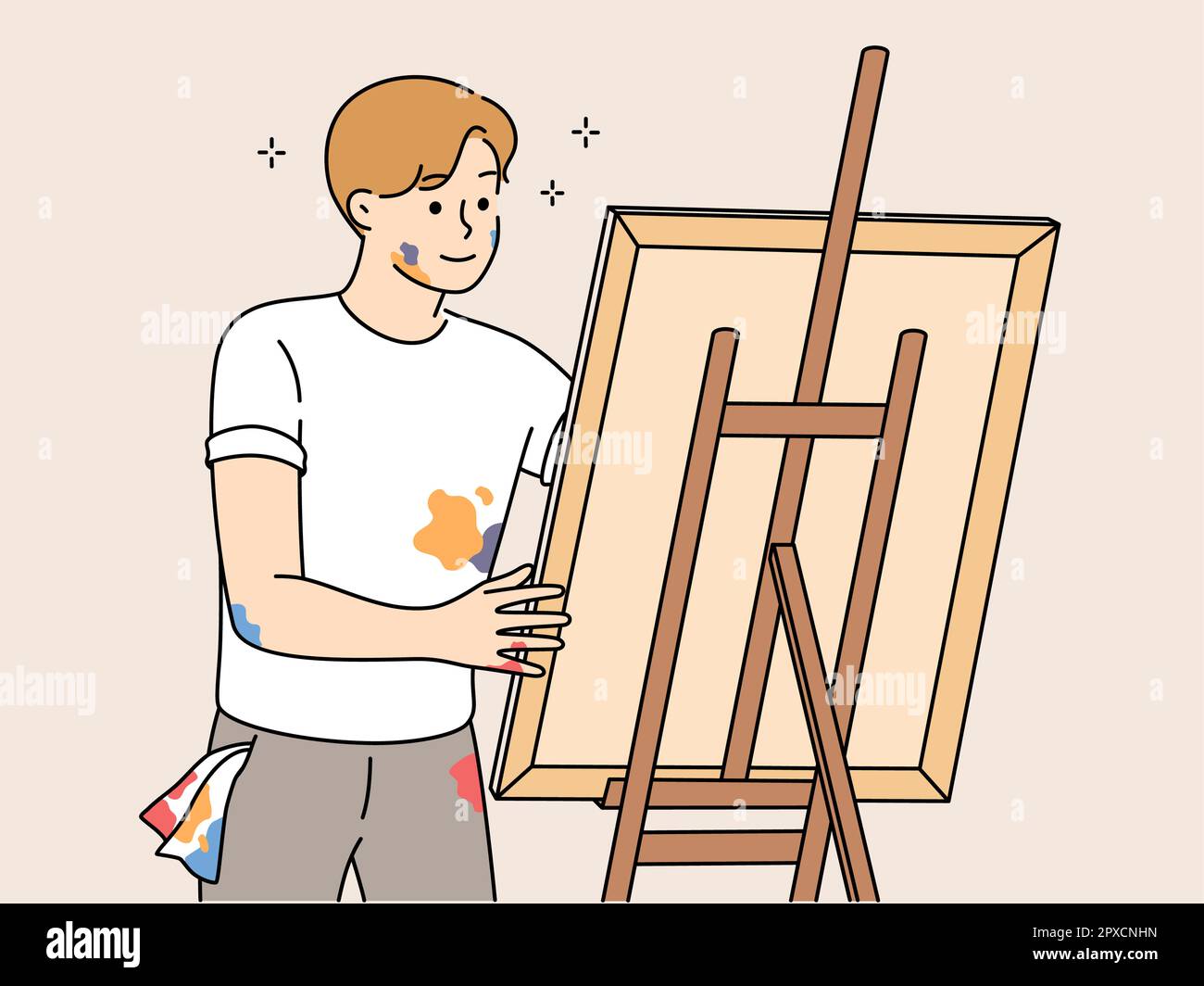 Happy young man drawing picture on easel. Smiling male artist painting ...