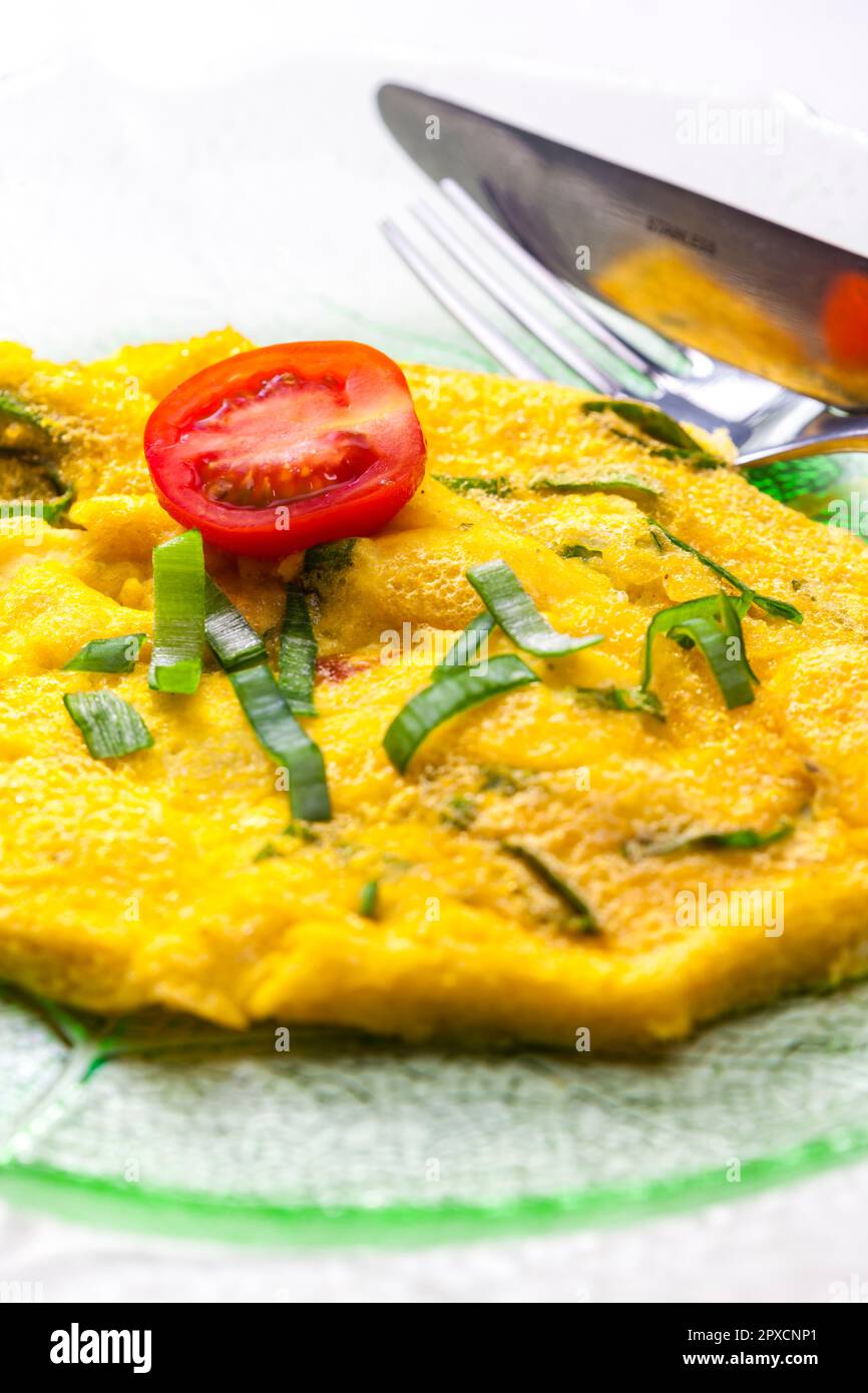 egg omelette with spring onion and tomato Stock Photo - Alamy