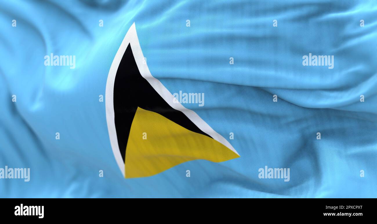 Detail of Saint Lucia national flag waving in the wind. Saint Lucia is ...