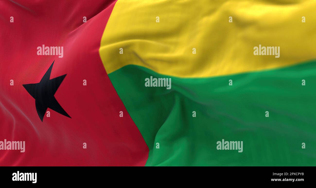 Detail of Guinea-Bissau National flag waving. The Republic of Guinea ...