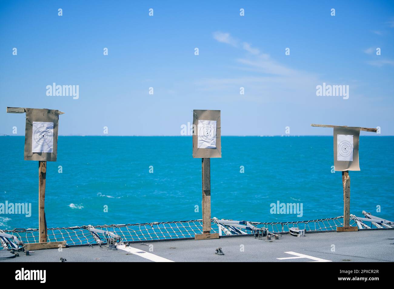 Color image of a paper shooting target on a pole Stock Photo - Alamy