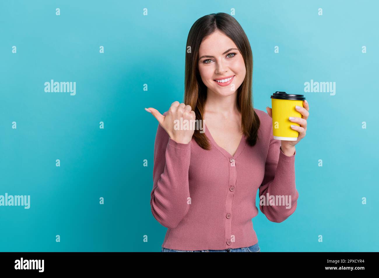 Photo of young attractive girl hold plastic cup coffee directing finger ...
