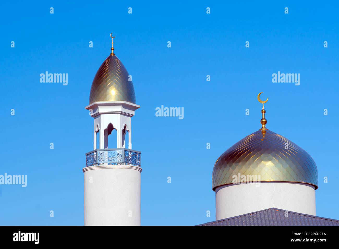 A Muslim golden dome with a crescent moon on the mosque. Minaret ...