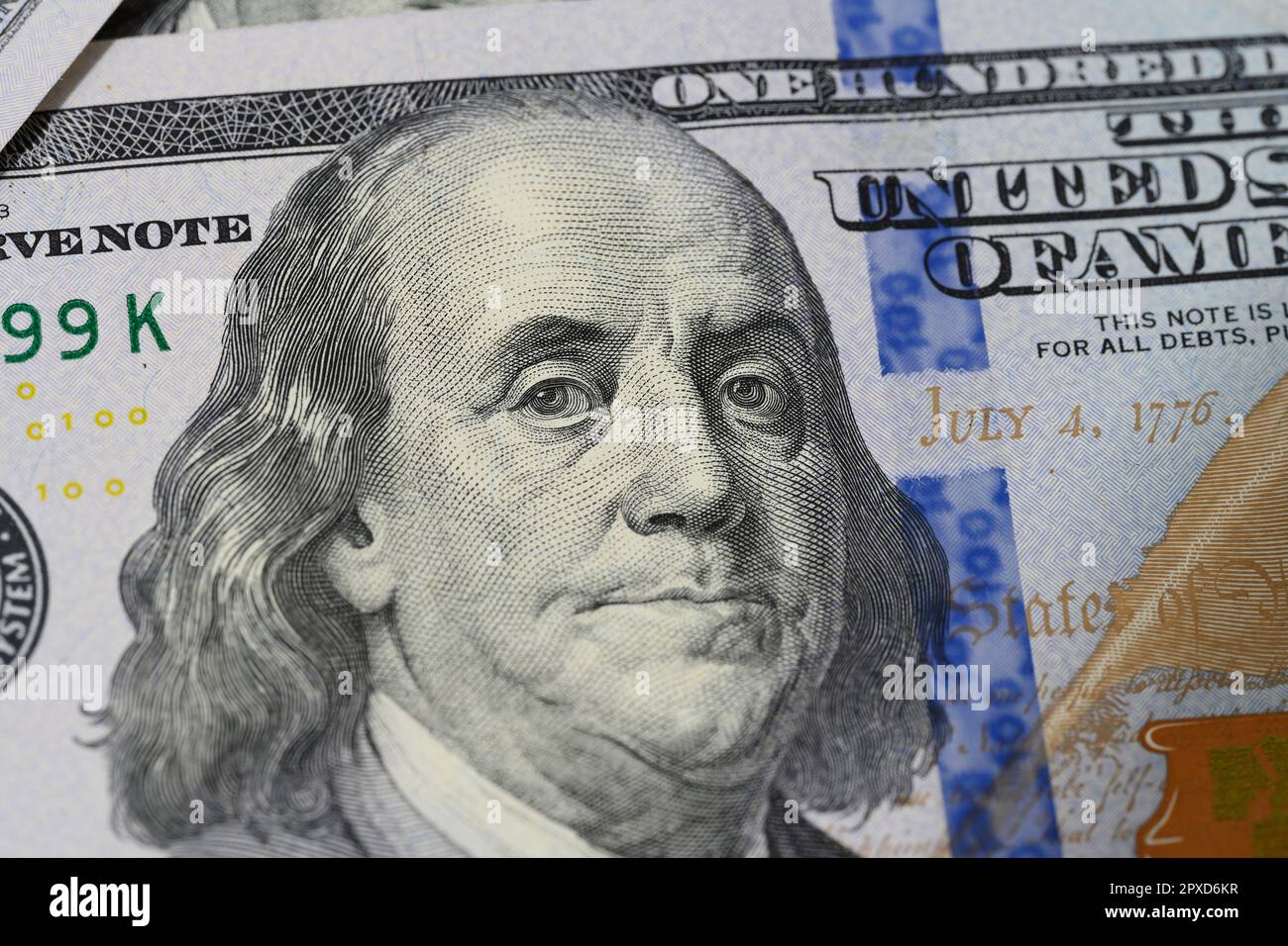 Fragment of one hundred dollar bill with a portrait of Benjamin ...