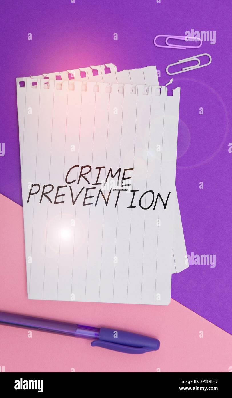 Sign displaying Crime Prevention, Word for Federal Offense actions ...