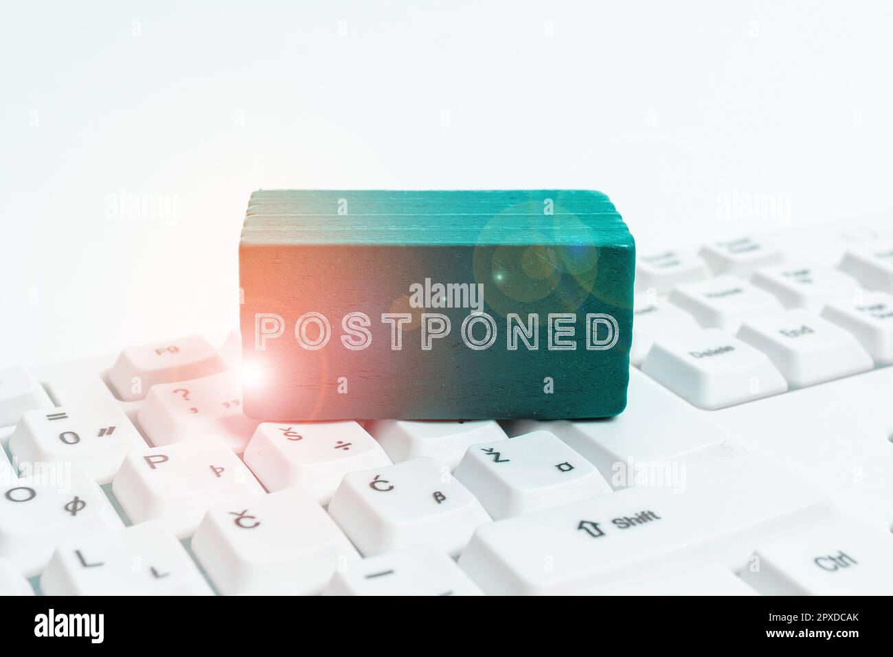Sign displaying Postponed, Conceptual photo to place later in order of ...