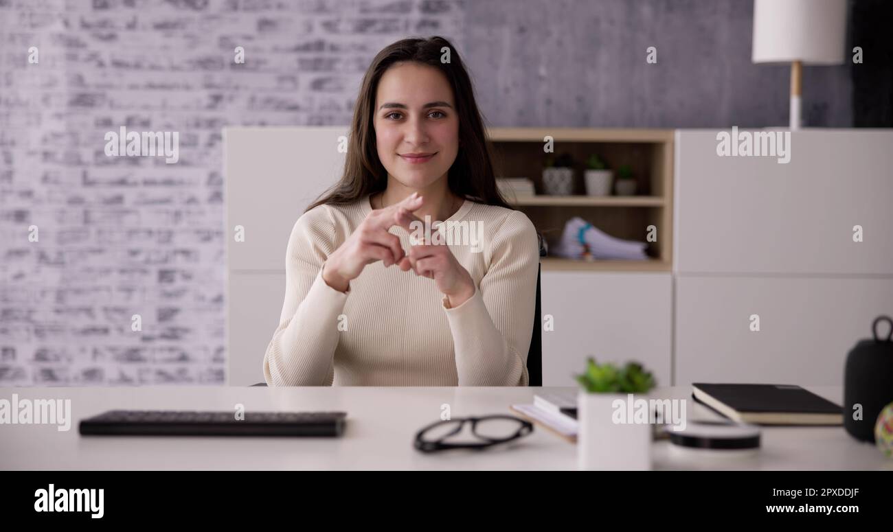 Adult Learning Sign Language For Deaf Disabled Stock Photo - Alamy