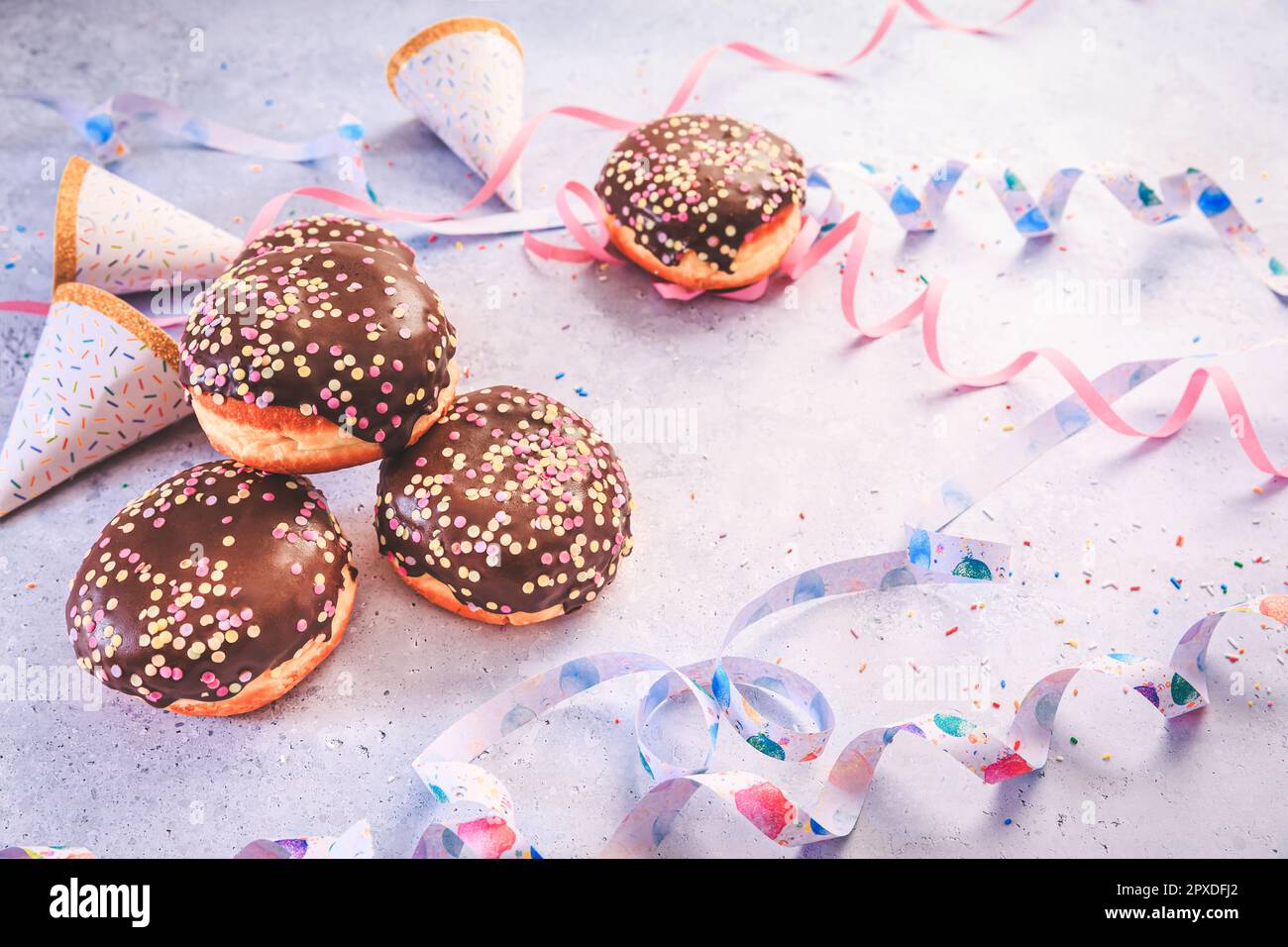Chocolate Berliner pastry for carnival and party. German Krapfen or ...
