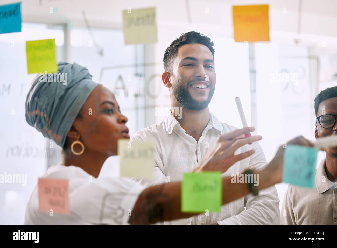 Great plans are created when we work together. businesspeople having a ...