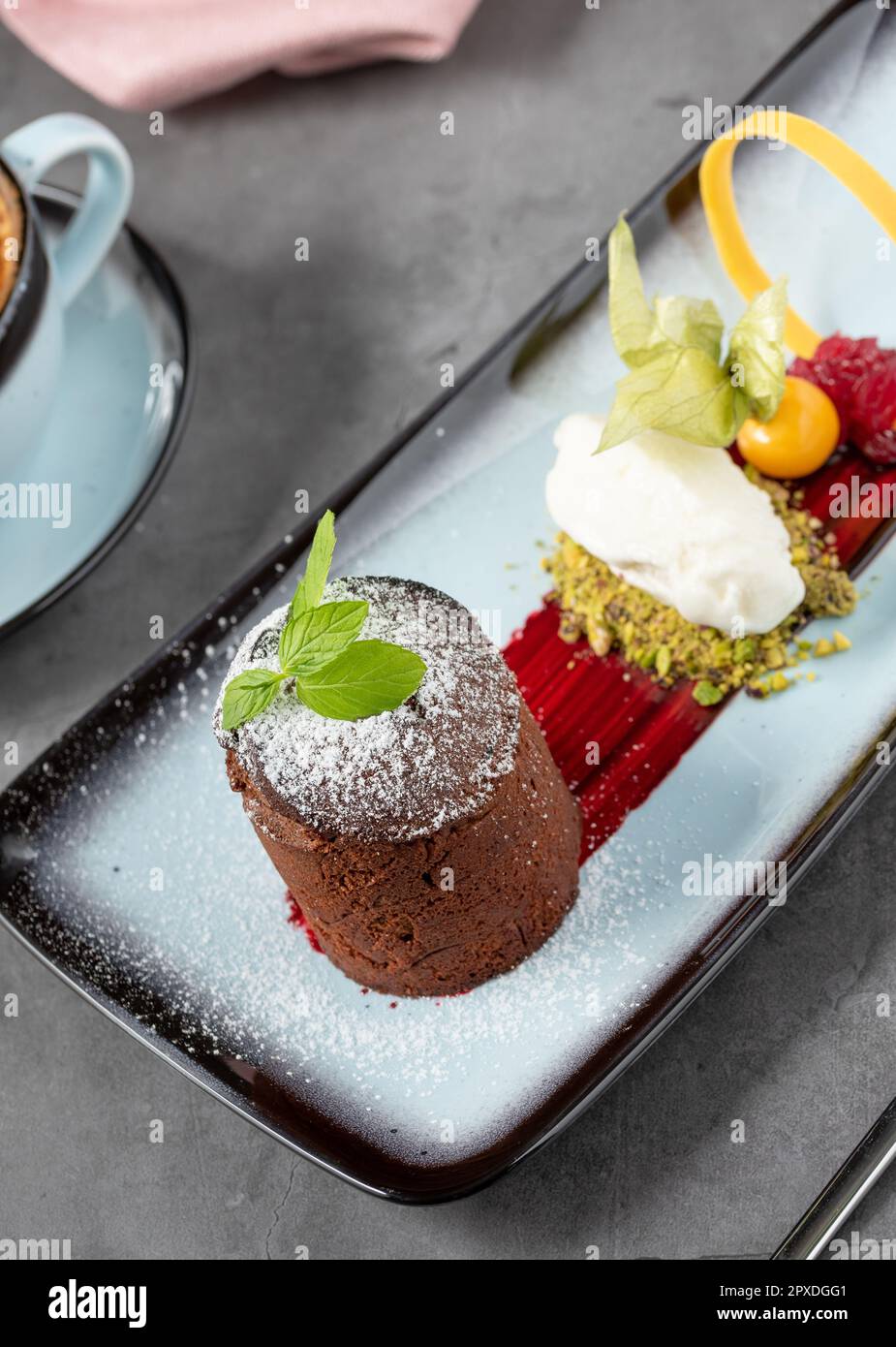 Chocolate souffle with ice cream served in a fine dining restaurant ...