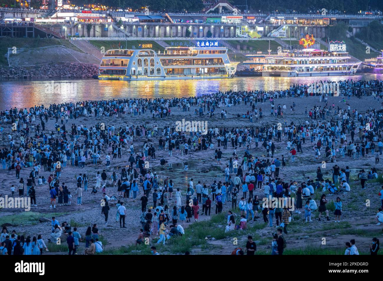 CHONGQING, CHINA - MAY 1, 2023 - Tourists enjoy the night view of ...
