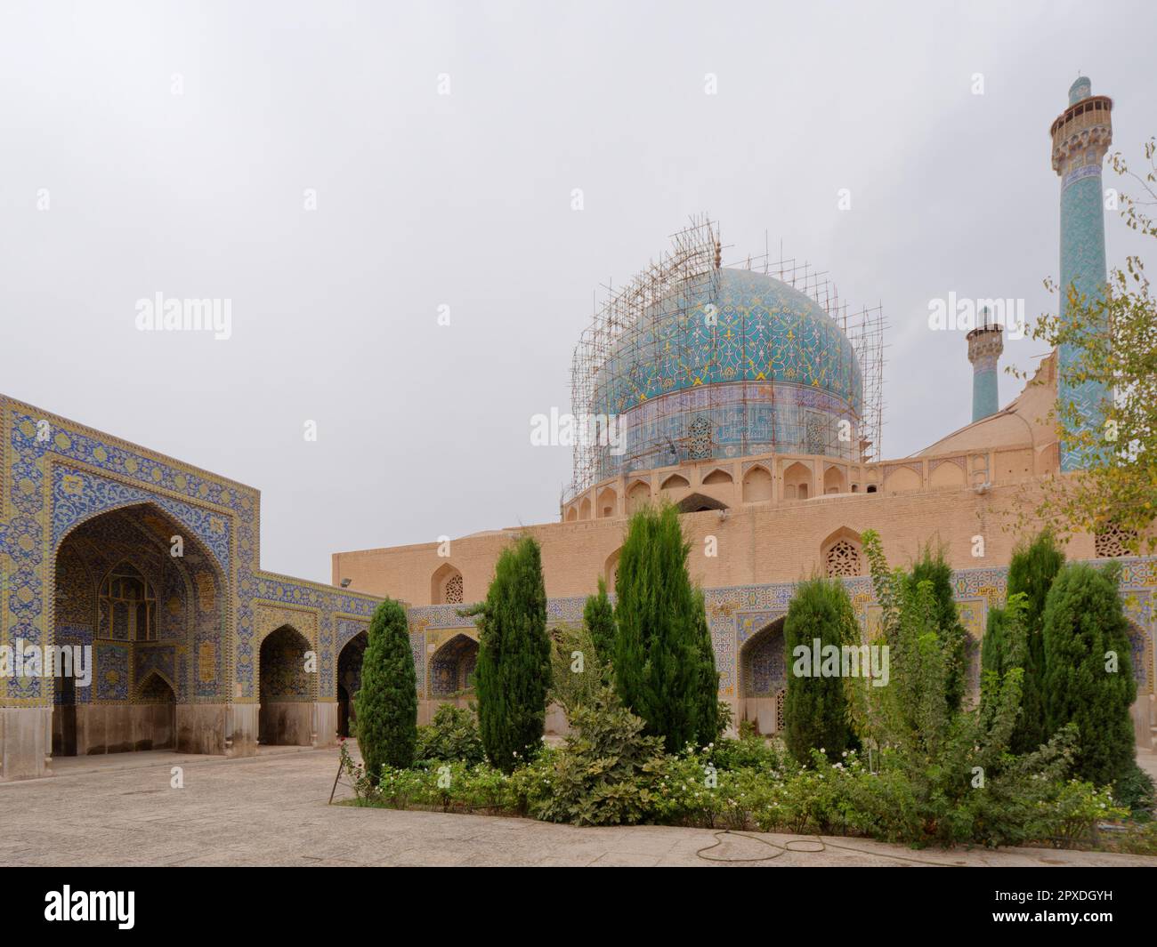 The historic Great Mosque of Isfahan in Iran with trees in the ...