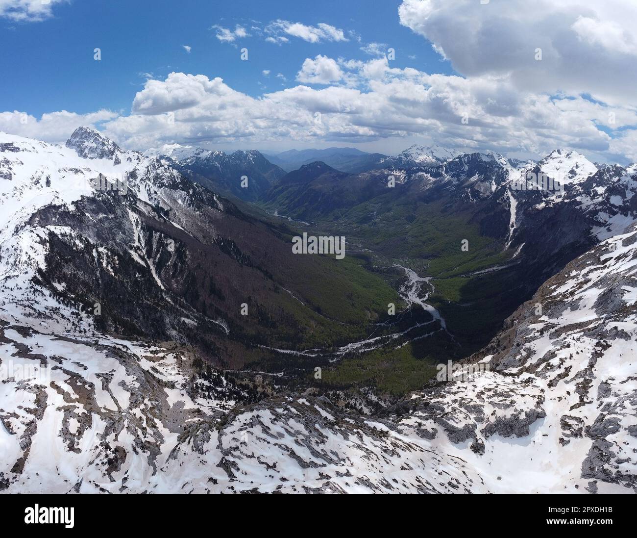 Panorama looking down over the green Theth valley from the Qafa e Pejes ...