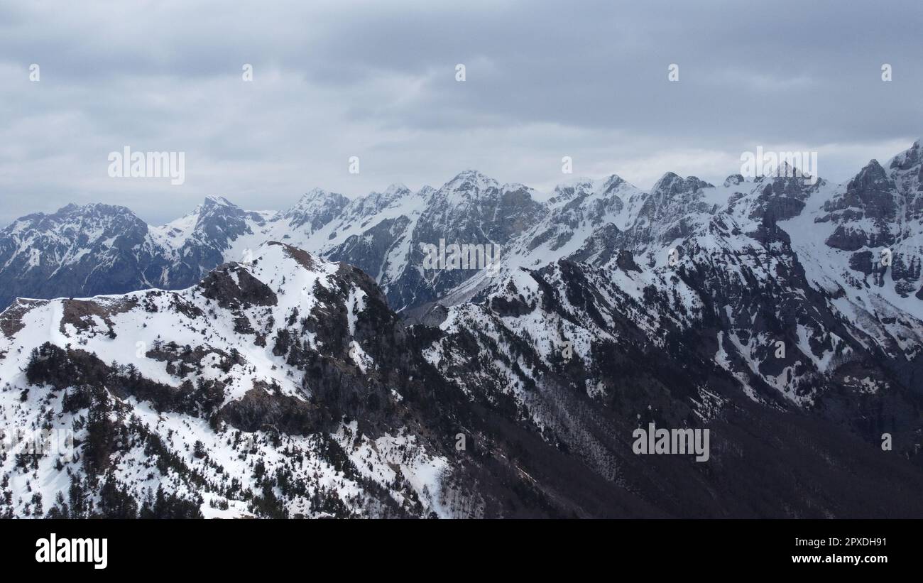 Panorama looking ove the snow capped Accursed mountains, Theth, Albania ...