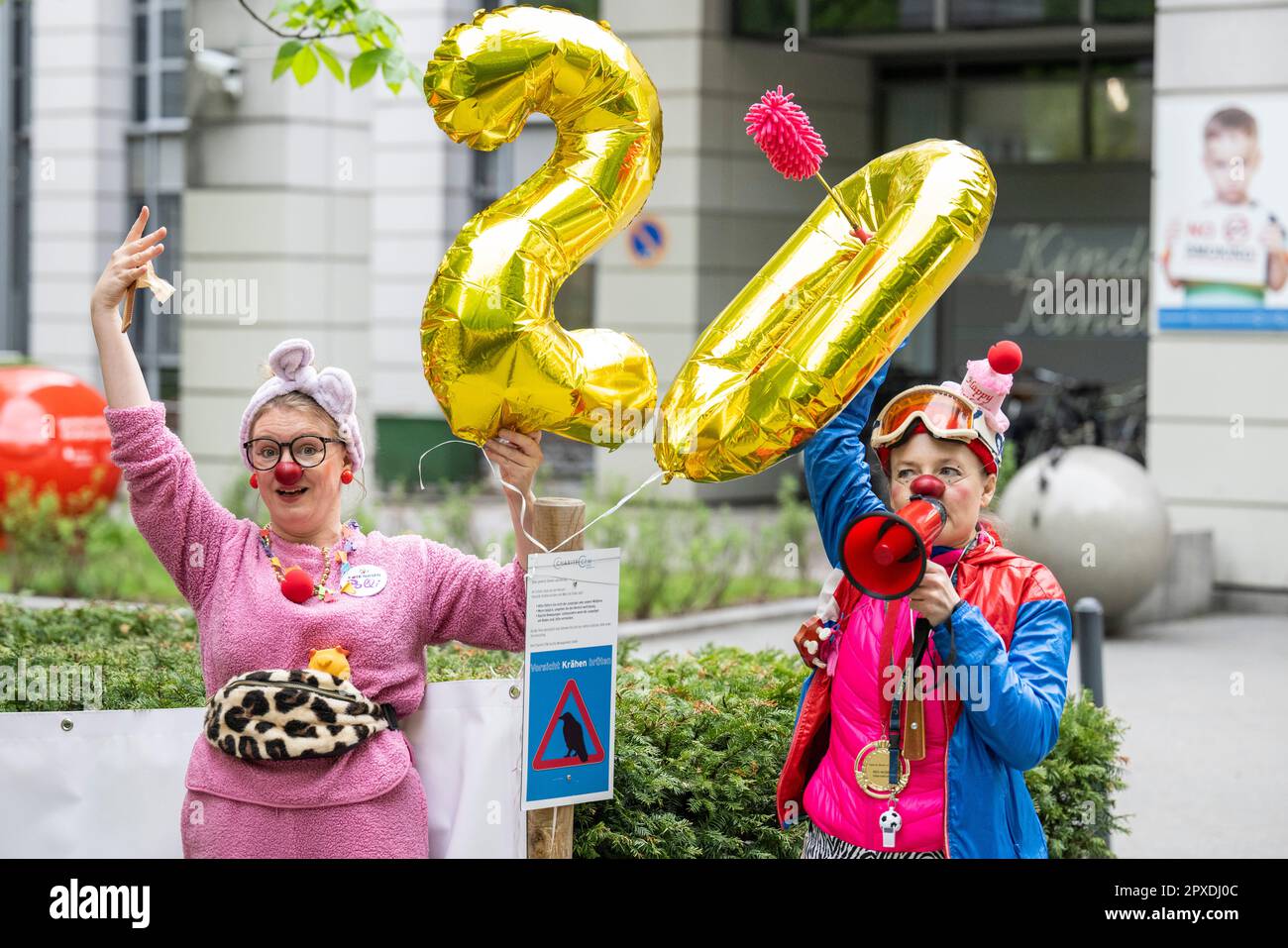 Berlin, Germany. 02nd May, 2023. Clowns Polli and Natascha hold up two ...