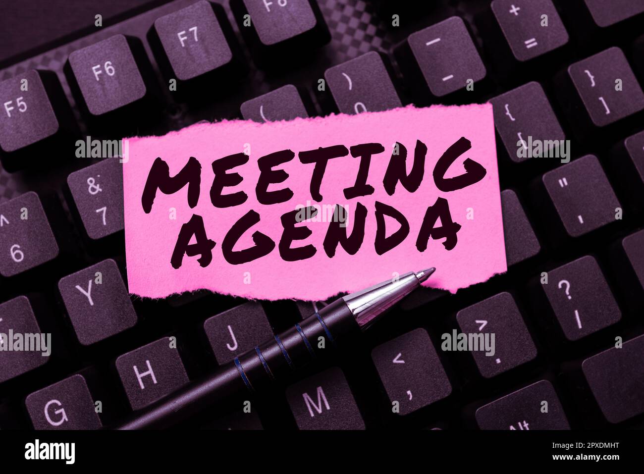 Hand writing sign Meeting Agenda, Word Written on An agenda sets clear ...