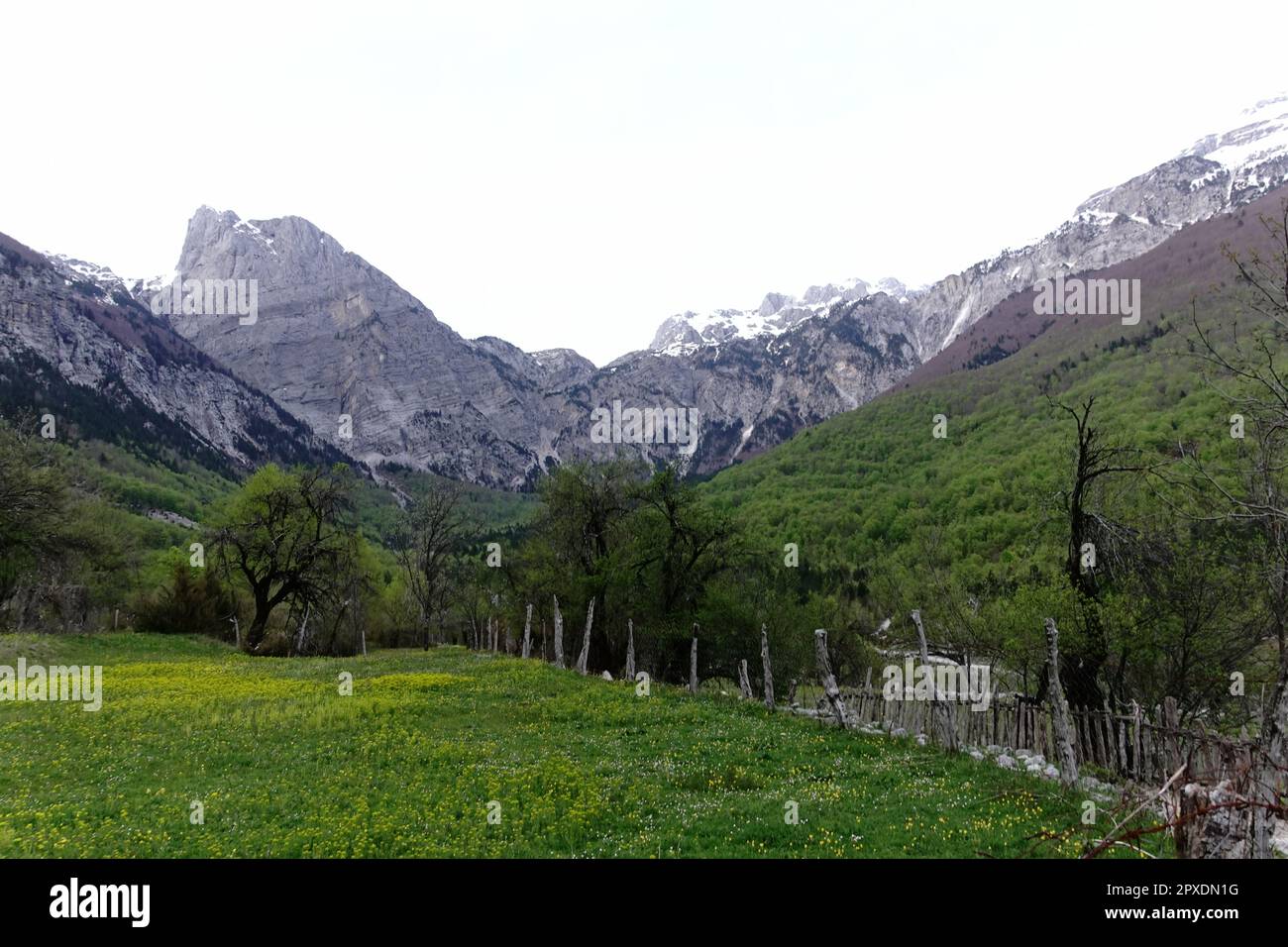 View from Okol in the Theth Valley looking up towards the snow capped ...