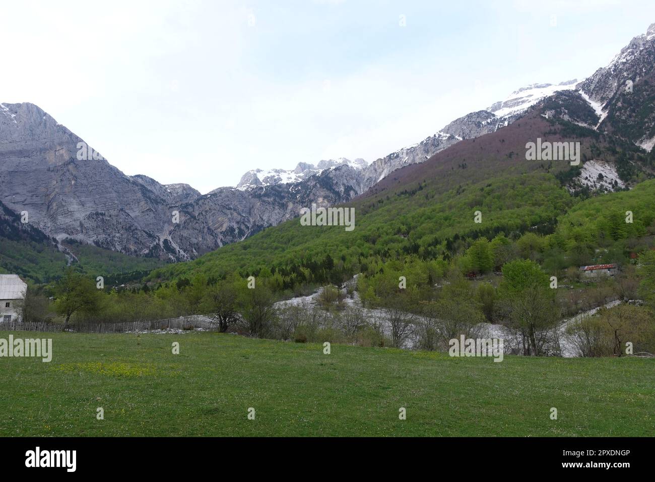 View from Okol in the Theth Valley looking up towards the snow capped ...