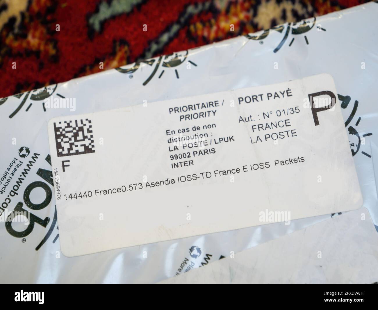 Paris, France - Dec 2, 2022: A person holds an envelope from La Poste ...