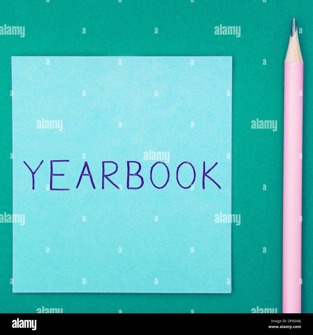 Sign displaying Yearbook, Word for publication compiled by graduating ...