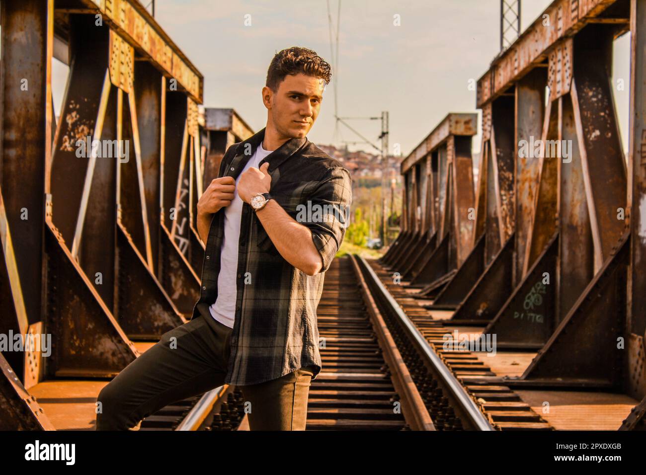 Person standing on train bridge hi-res stock photography and images - Alamy