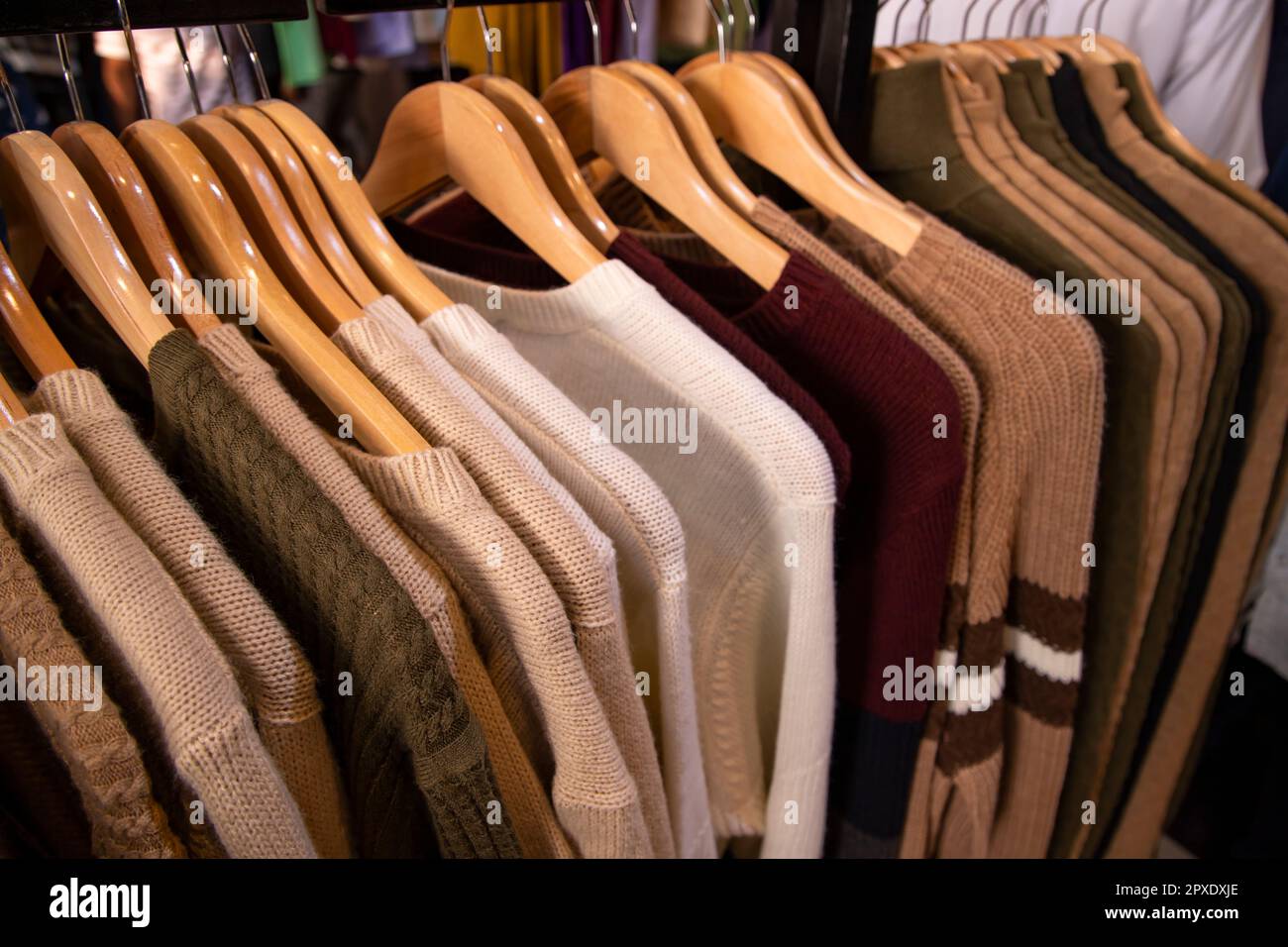 Clothes on hangers in a clothing store, close-up Stock Photo - Alamy