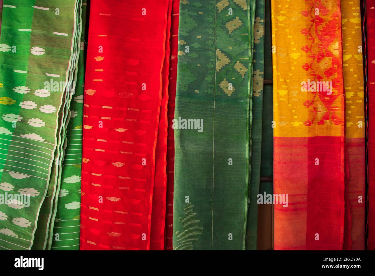 Bangladeshi Women,s Traditional Colorful Jamdani saree hanging in the ...