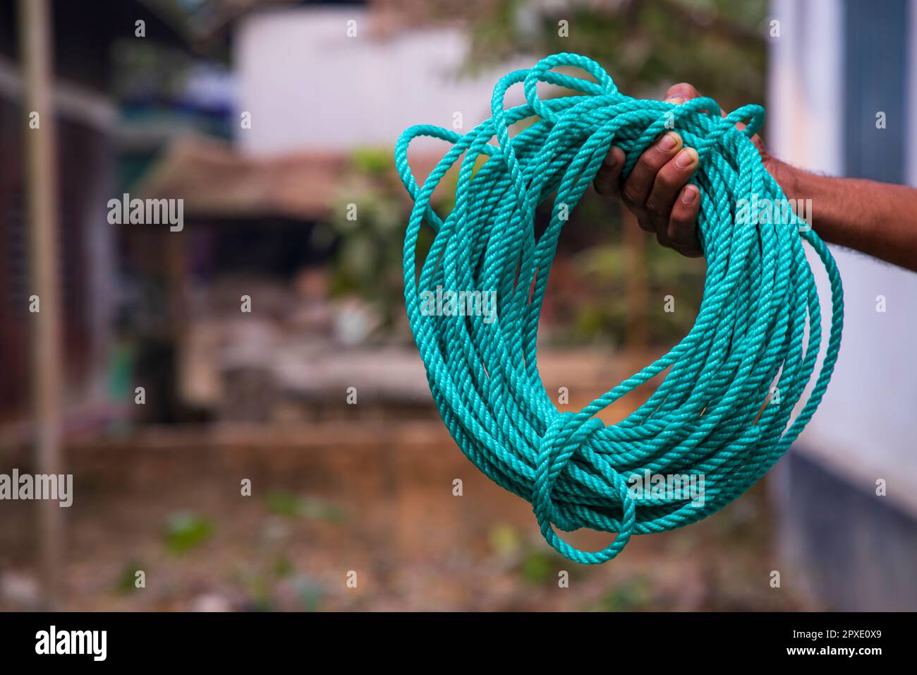 Hand string tie knot hi-res stock photography and images - Alamy