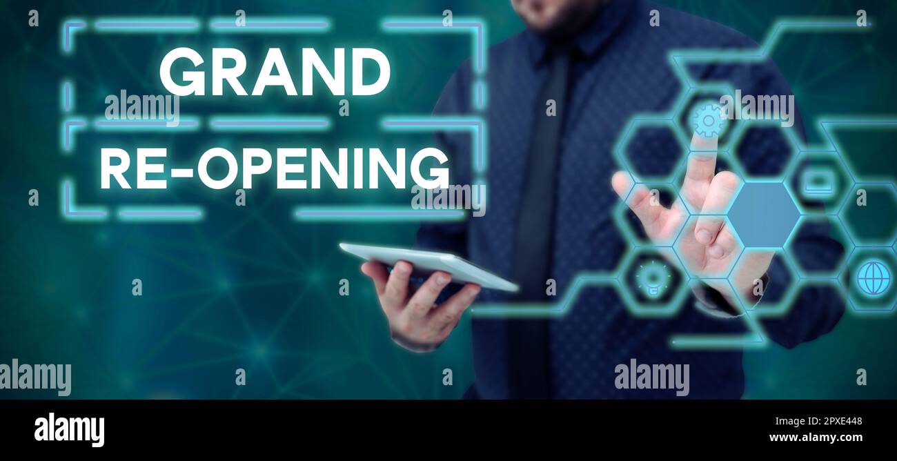 Sign displaying Grand Re Opening, Business idea held to mark the ...