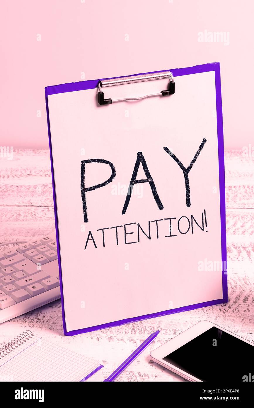 Hand writing sign Pay Attention, Word Written on take notice of someone ...