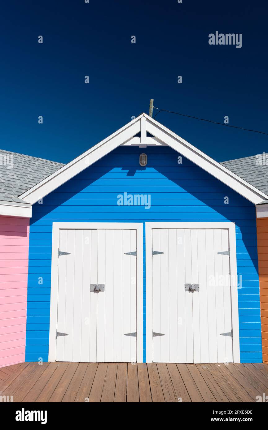 blue beach hut building in summer. photo of beach hut in summer. beach ...
