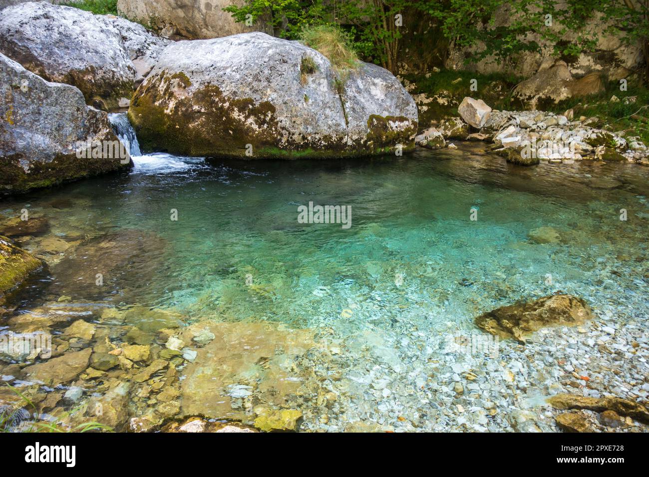 Beautiful spring reservoir near Bulnes village in Picos de Europa ...