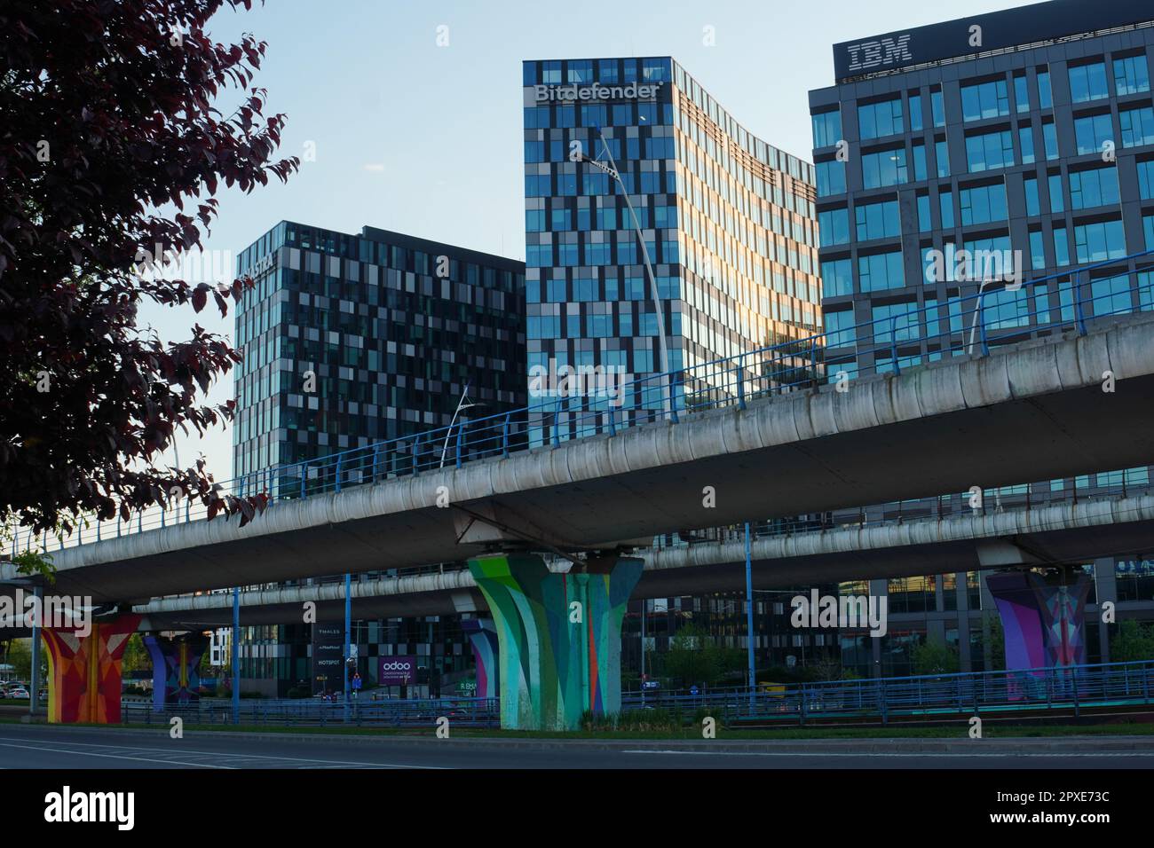 Orhideea Towers office buildings and overpass bridge with colorful ...
