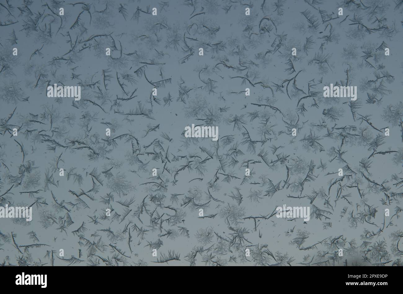 Frost on the windshield of a car as seen from the inside. Kawayu Onsen ...