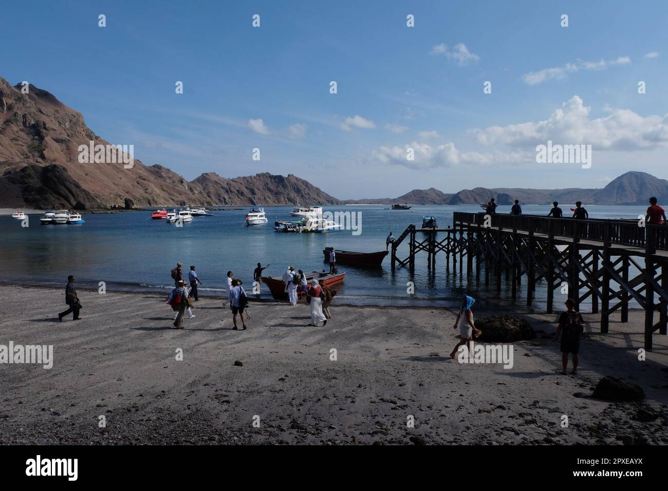 PADAR ISLAND, LABUAN BAJO, INDONESIA - NOVEMBER 2019: Tourists visit ...