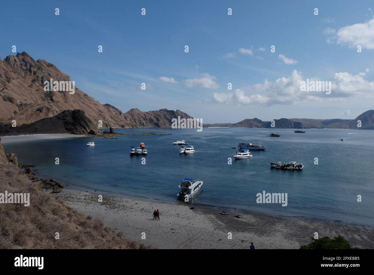 Tourists visiting Padar Island in Labuan Bajo during the dry season, a ...