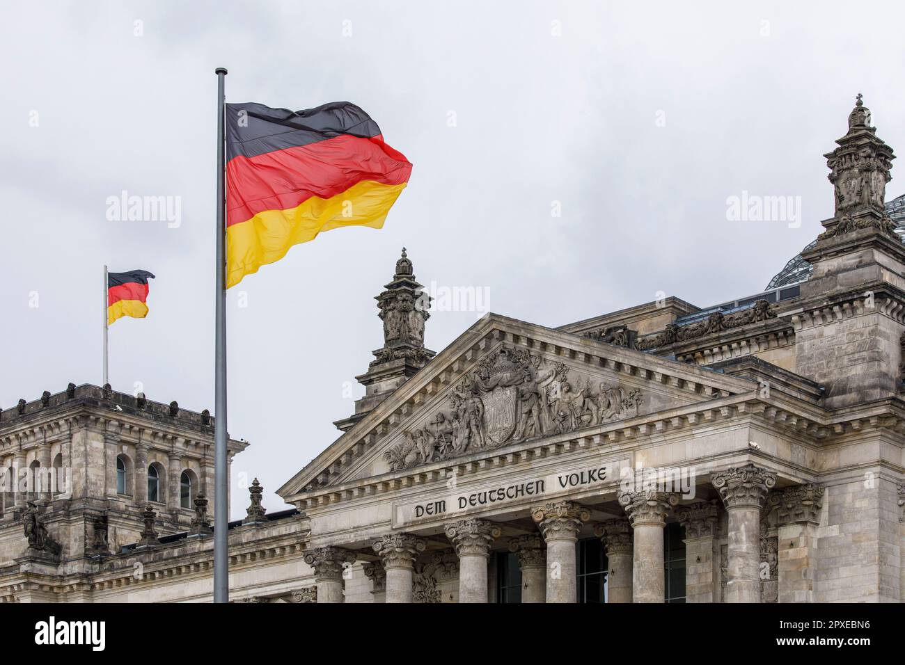 Reichstag building with German flags on Platz der Republik square, seat ...
