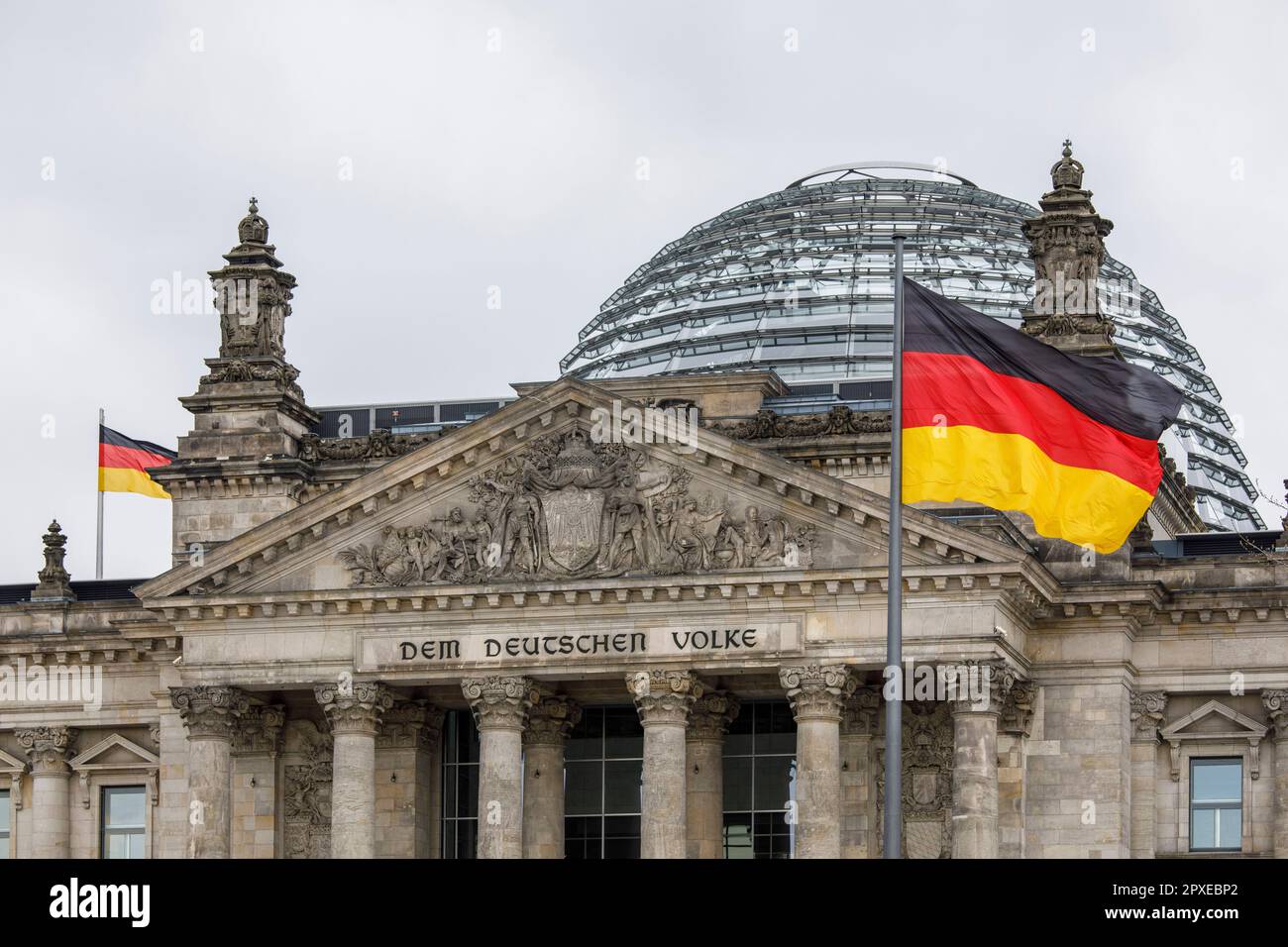 Reichstag building with dome and German flag on Platz der Republik ...